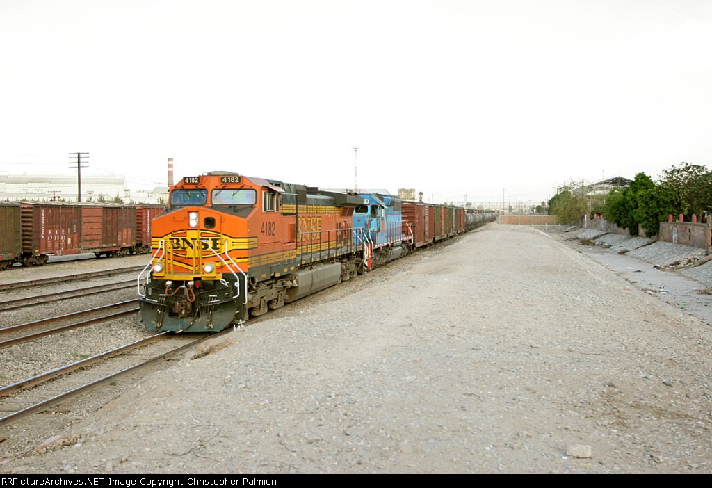 BNSF 4182 and FXE 3156